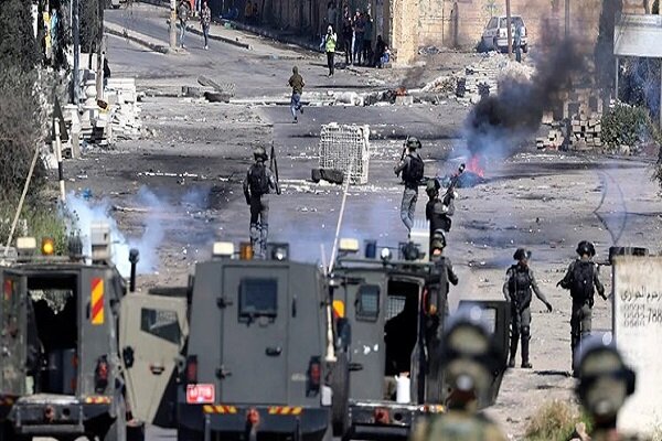 30 injured as Zionists raided Palestinian refugee camp in WB - Mehr ...